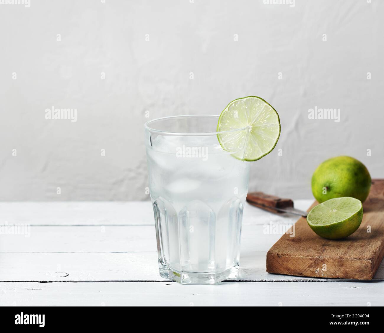 Cold lime drink with ice on a white background Stock Photo - Alamy