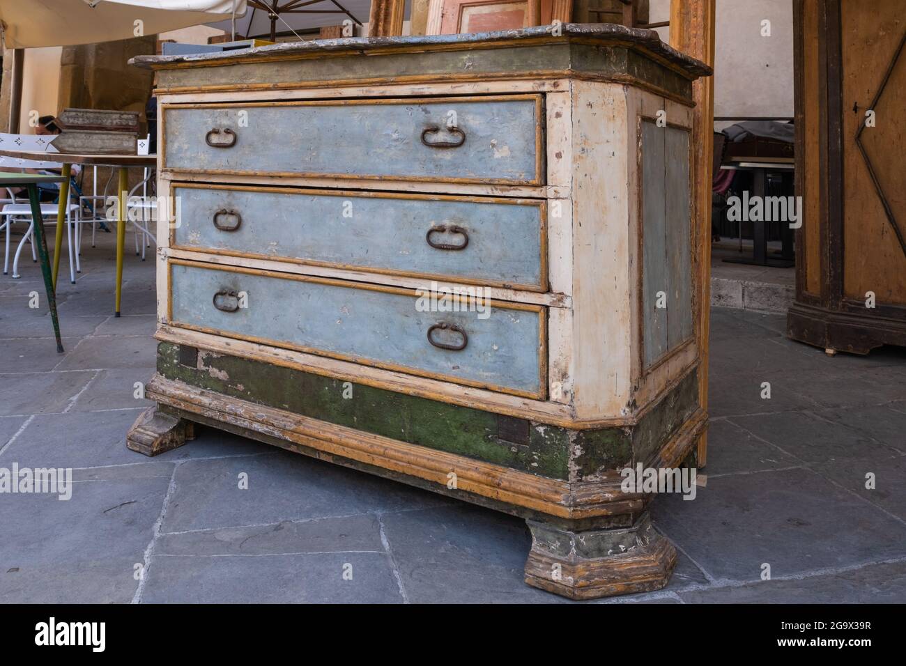 Old chest drawer on flea market in Arezzo Italy Stock Photo - Alamy