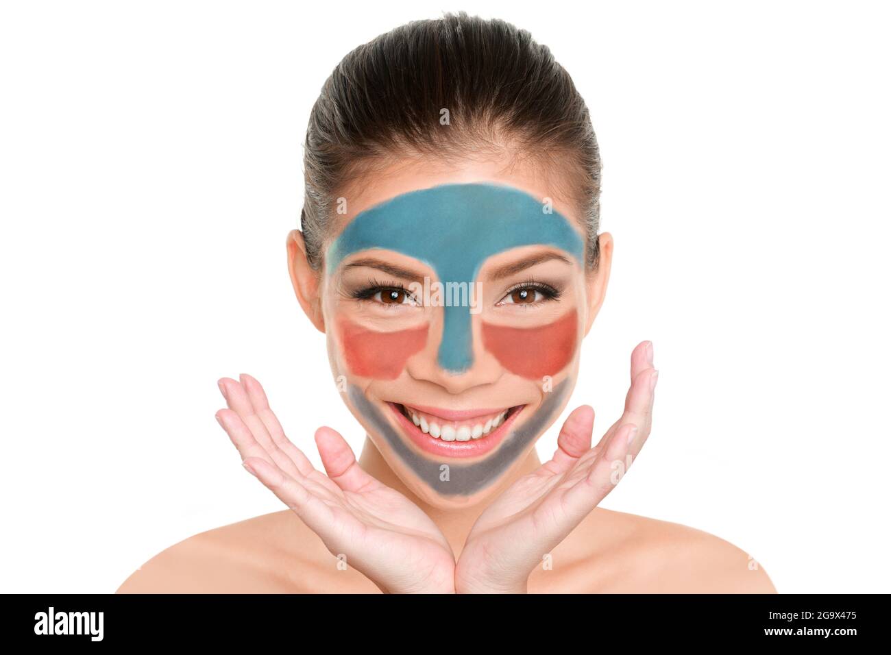 Fun beauty product multimask woman applying different masks on skin ...