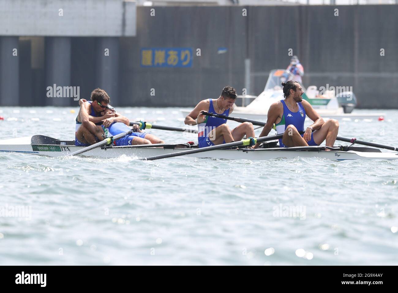 Tokyo, Japan. 28th July, 2021. Rowers of Team Italy react after rowing ...