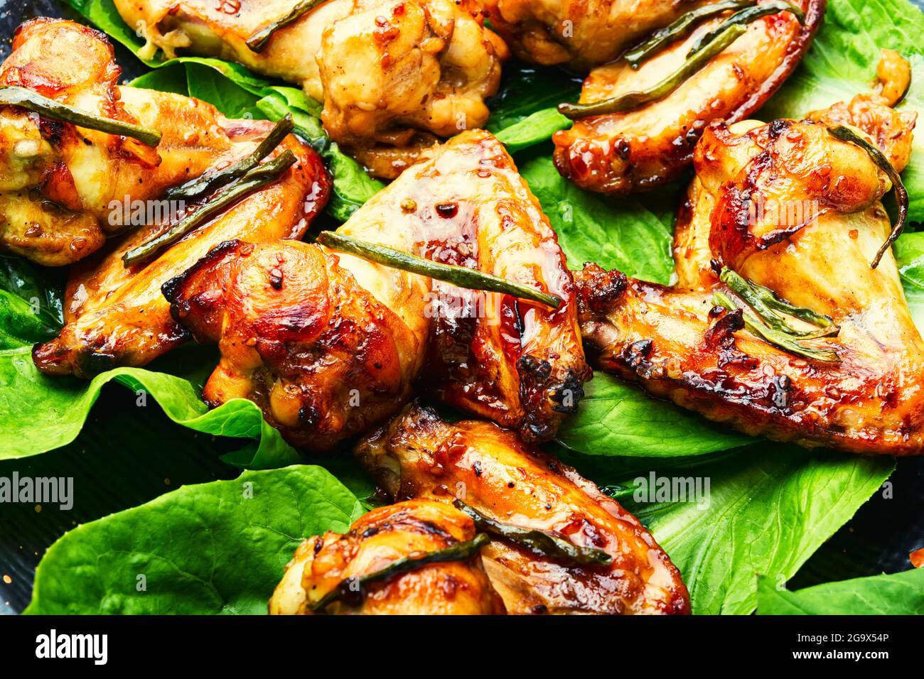 Chicken wings fried in teriyaki sauce.Appetizing chicken meat Stock ...