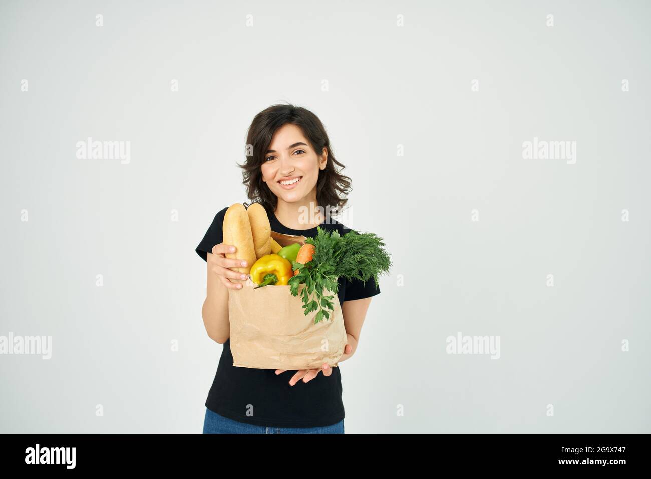 woman with package of groceries delivery service supermarket Stock ...