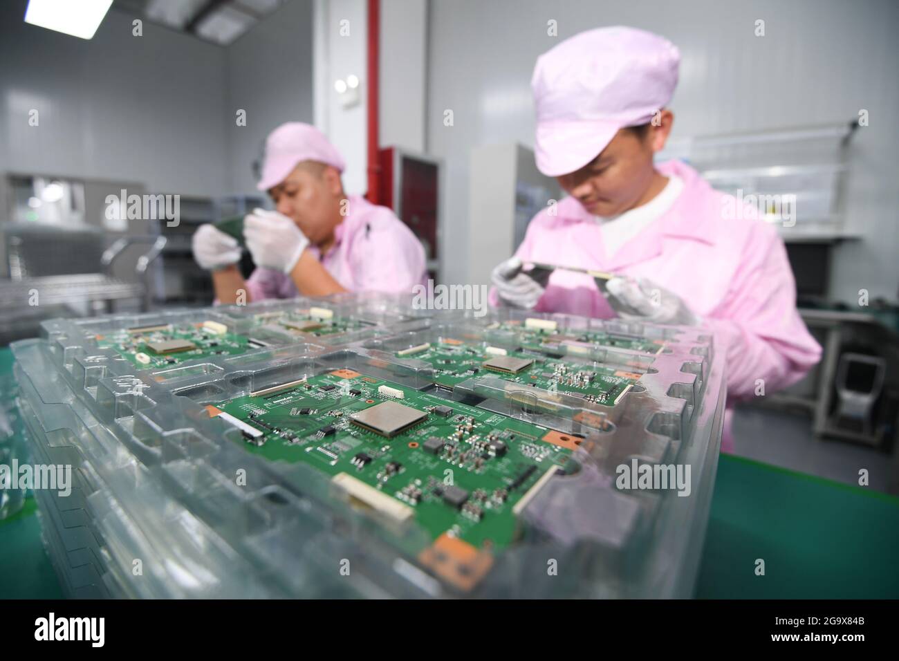 GUIYANG, CHINA - JULY 27, 2021 - Workers of Guiyang Zhenxin Technology ...