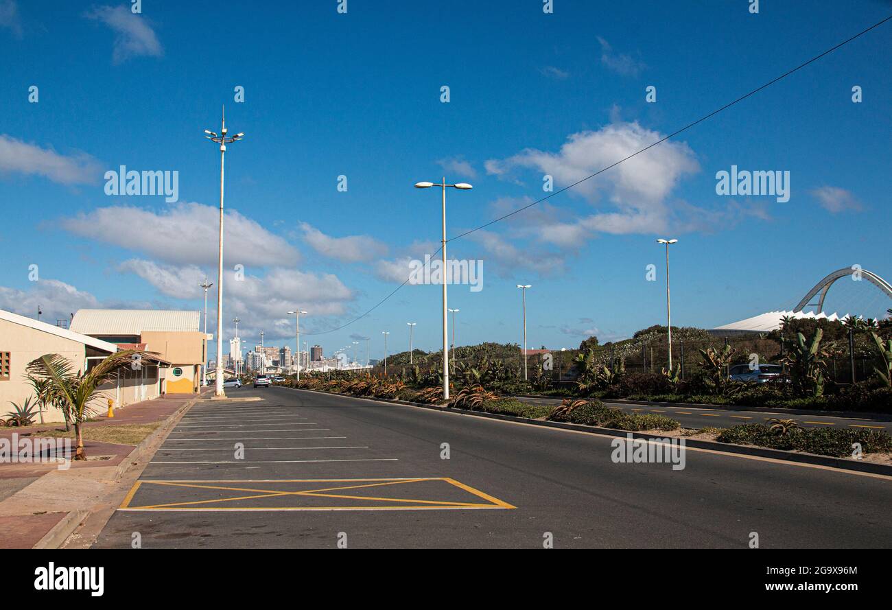 Empty beach road with durban buildings in background Stock Photo - Alamy