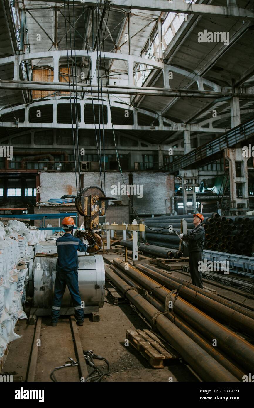 the production of ventilation and gutters, loading on a crane Stock ...