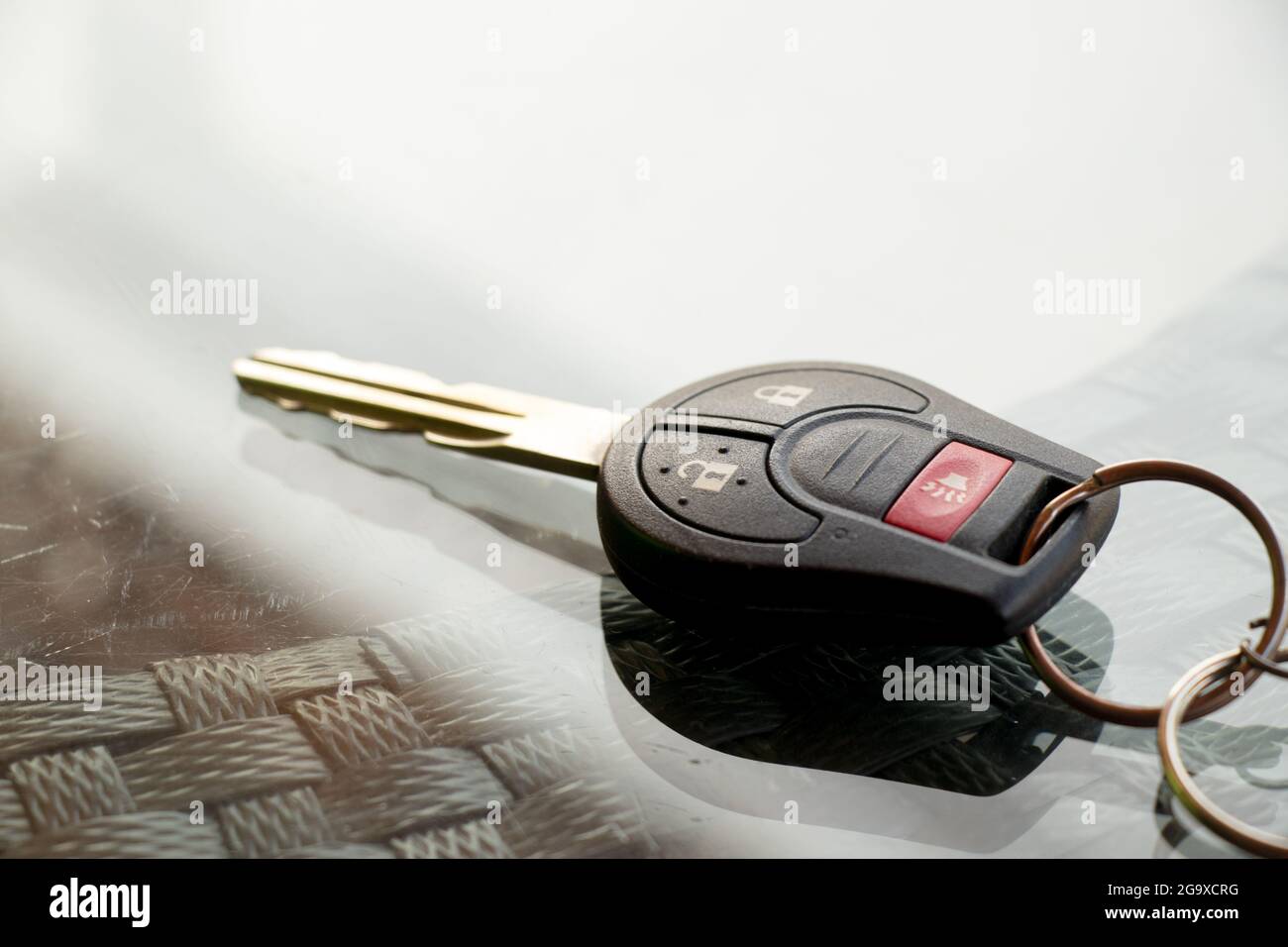 Car remote control placed on glass background Stock Photo - Alamy