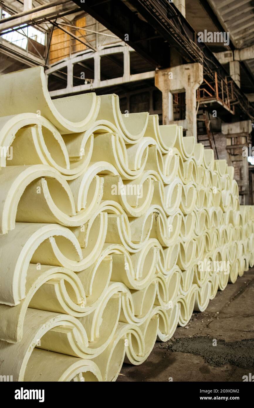 Factory, for the production of insulation for pipes Stock Photo - Alamy