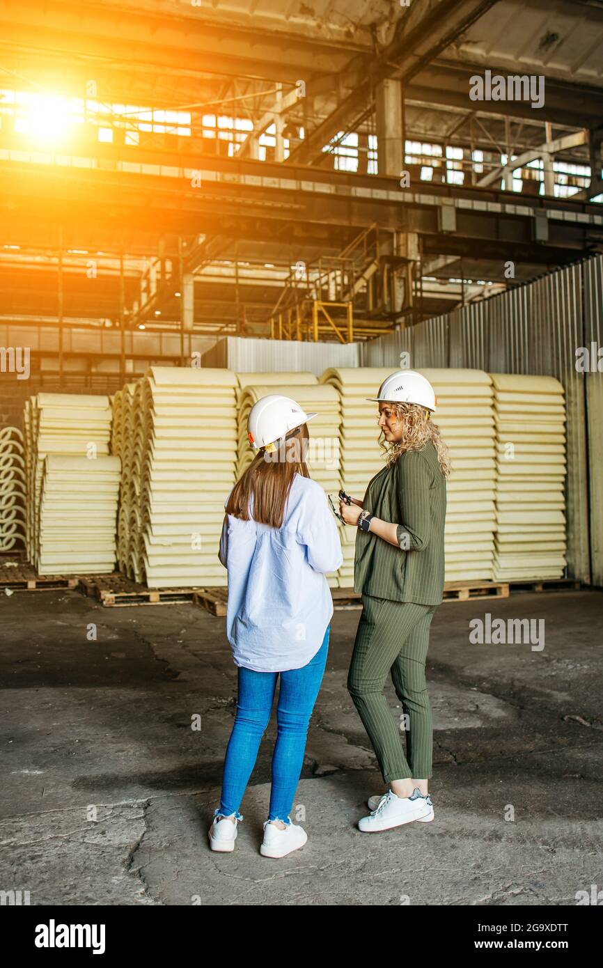 Factory, for the production of insulation for pipes Stock Photo - Alamy