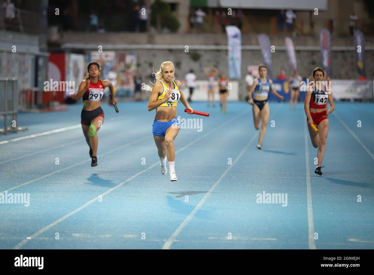 ISTANBUL, TURKEY - JUNE 12, 2021: Athletes running running 4x100 metres ...