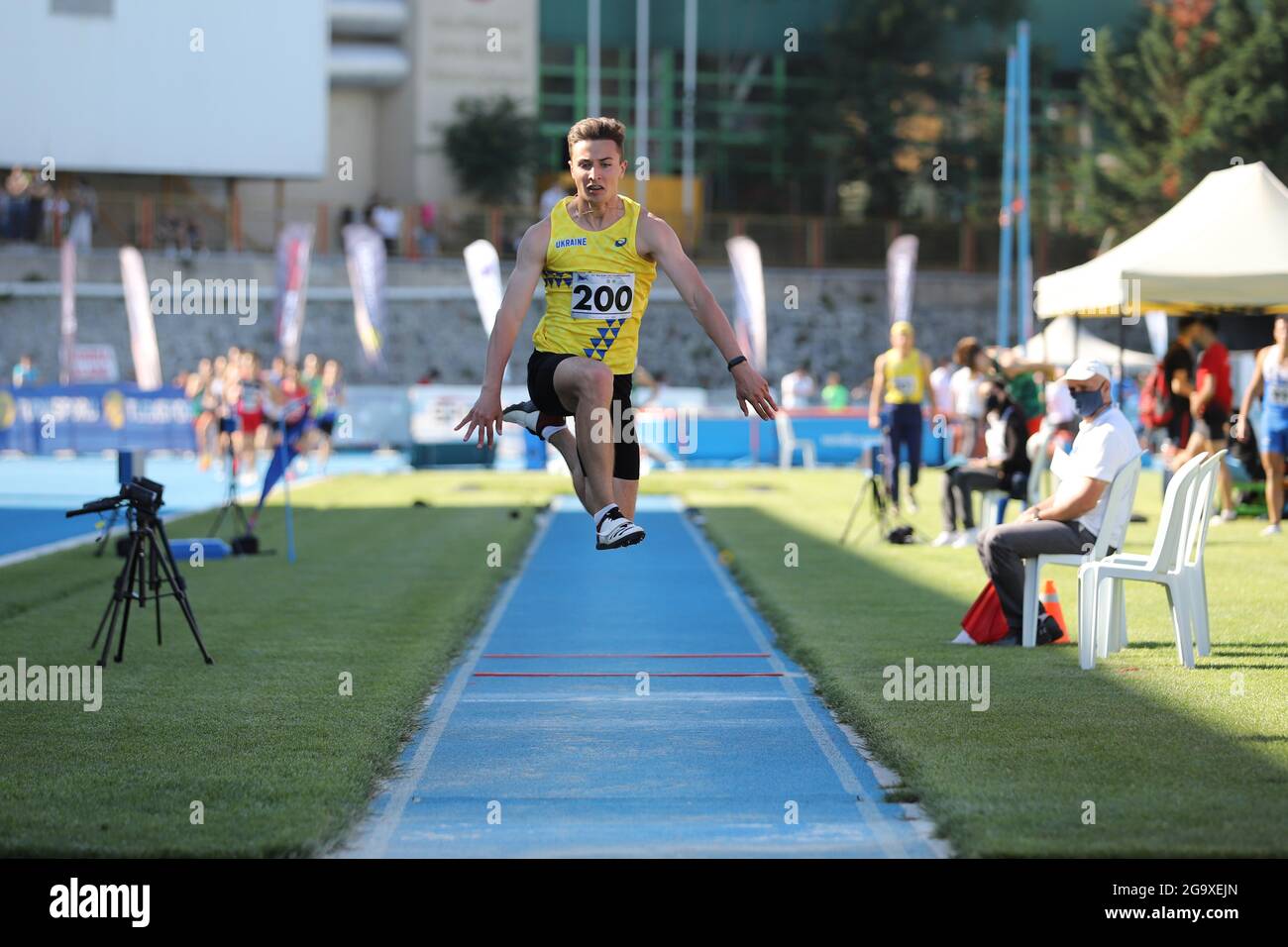 ISTANBUL, TURKEY - JUNE 13, 2021: Undefined athlete triple jumping ...