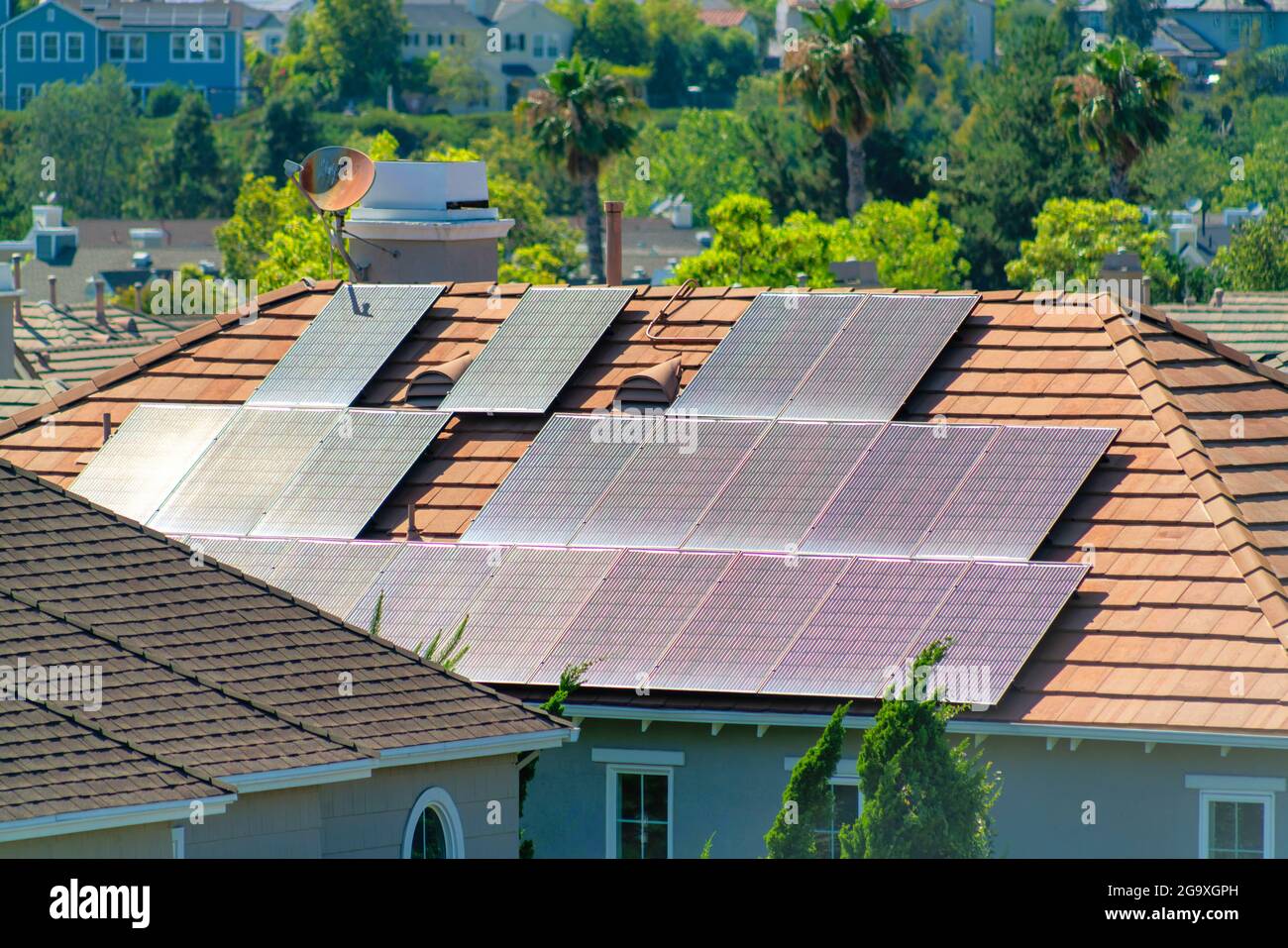 Solar panels covering house roof hi-res stock photography and images ...