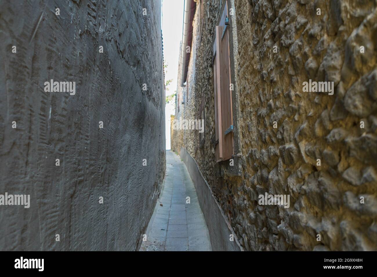 Narrow route between the stone buildings Stock Photo - Alamy