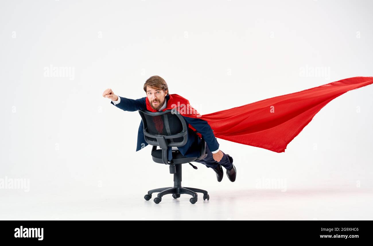 man in a suit red raincoat office chair manager Stock Photo - Alamy