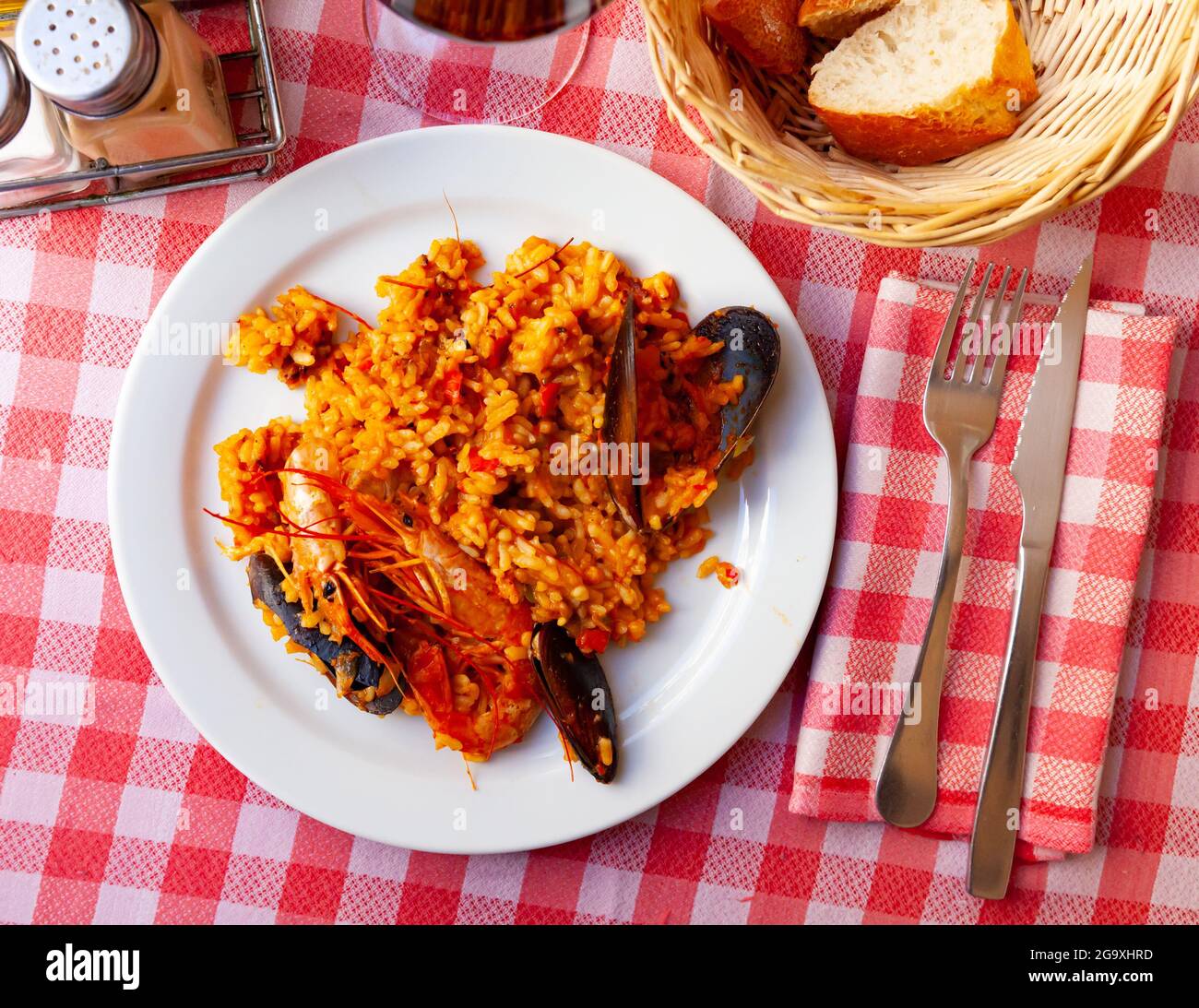 Spainsh dish seafood paella with rice, shrimps and mussels Stock Photo ...