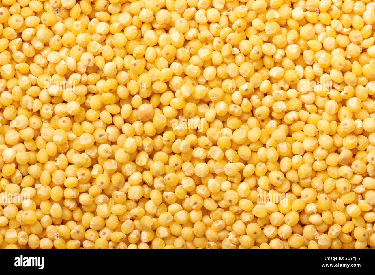Uncooked millet background. Abstract food texture Stock Photo - Alamy