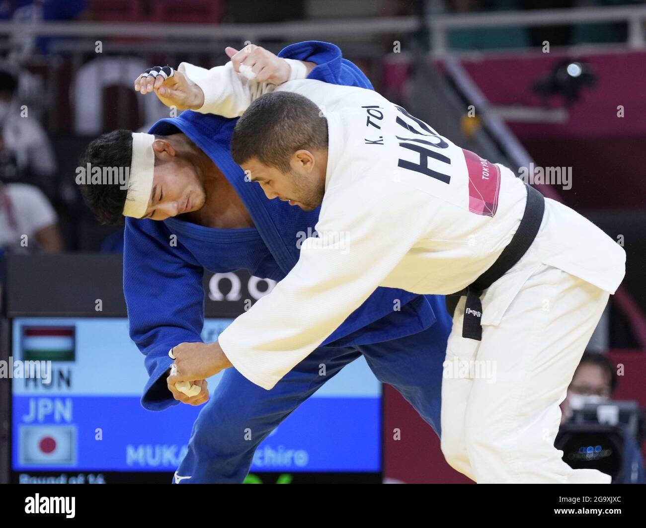 Krisztian Toth of Hungary (white) competes against Japan's Shoichiro ...