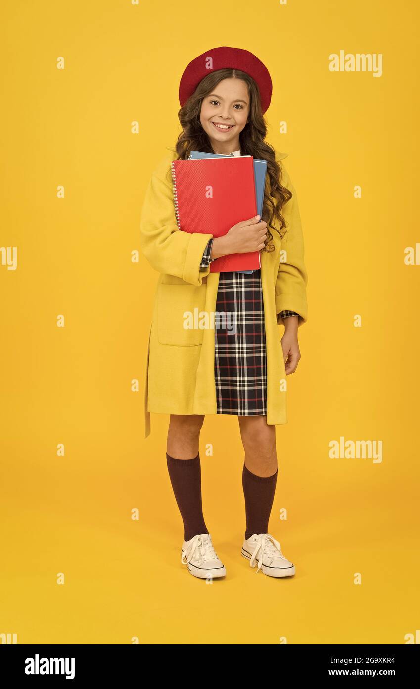 small girl with exercise book, lesson Stock Photo - Alamy