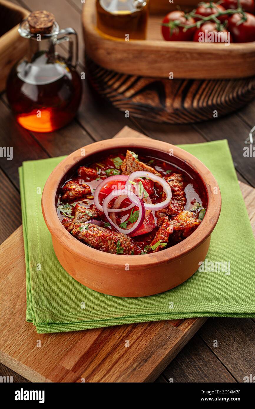 Georgian dish chakhokhbili stewed chicken Stock Photo - Alamy