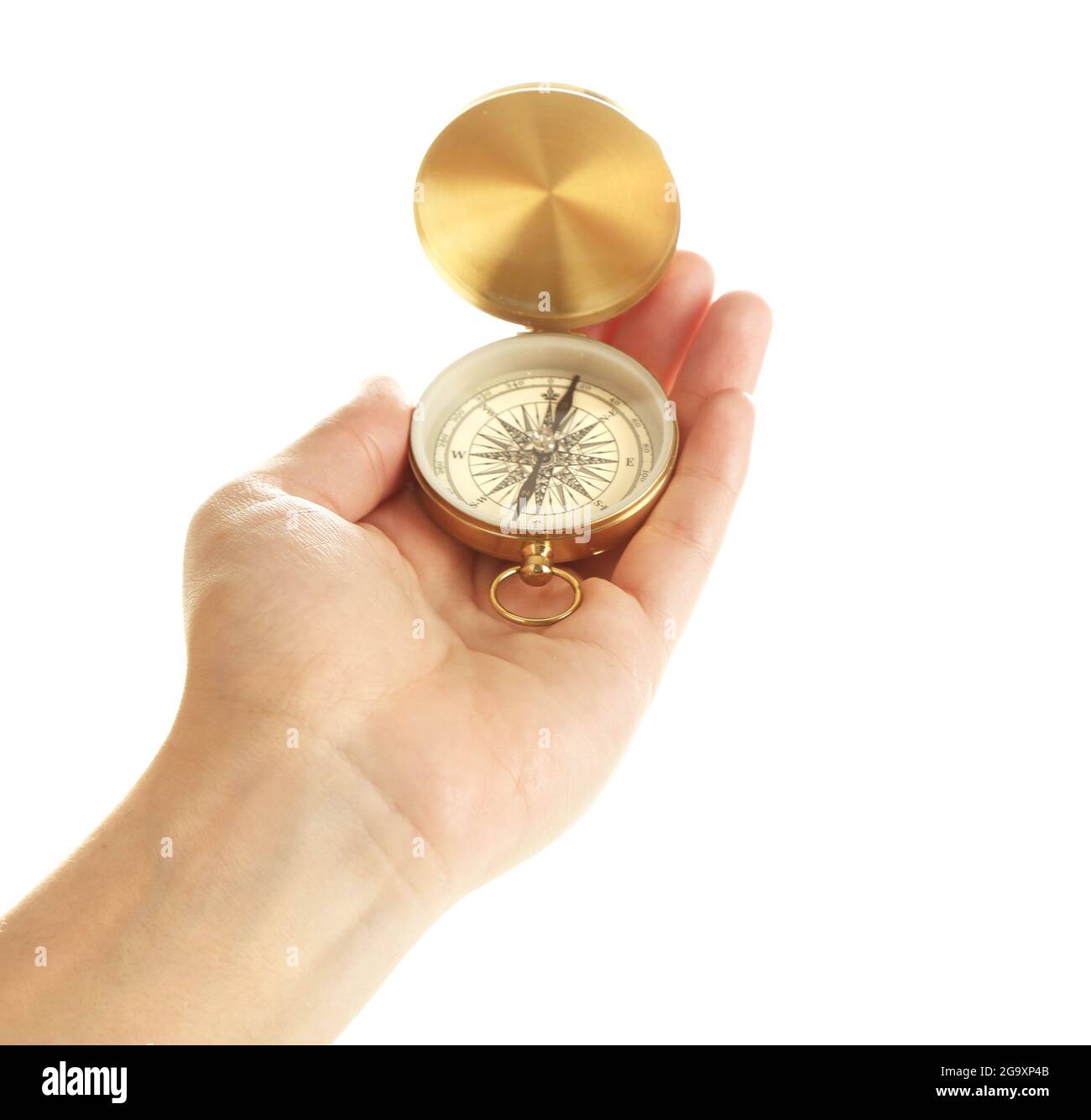 Female hand with compass Stock Photo - Alamy