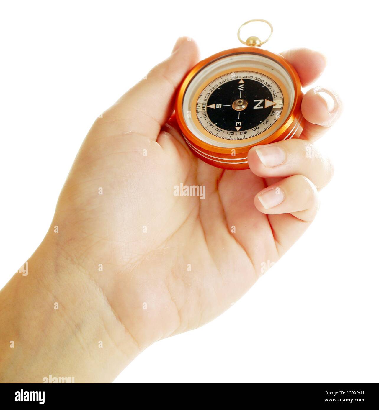 Female hand with compass Stock Photo - Alamy