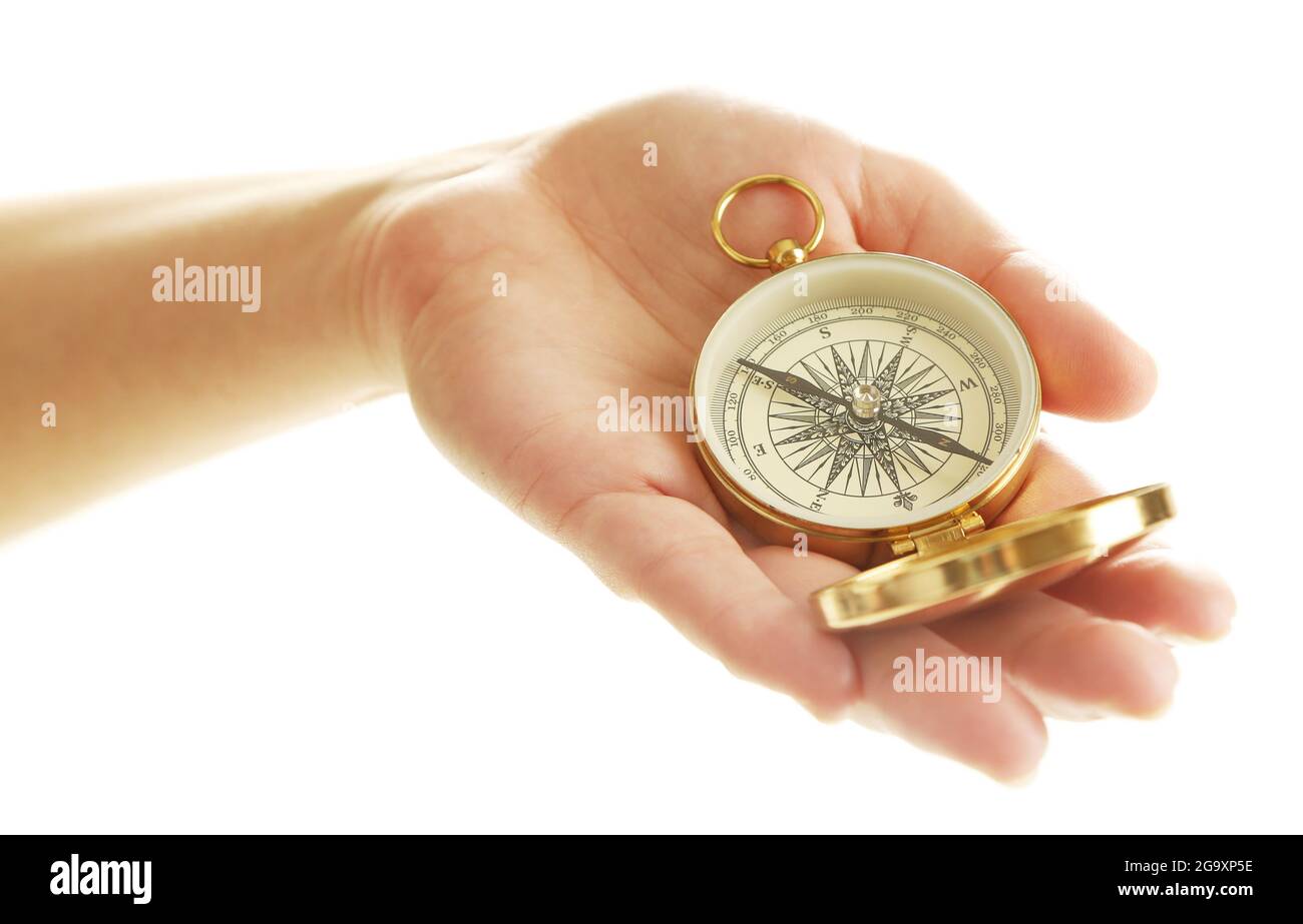 Female hand with compass Stock Photo - Alamy
