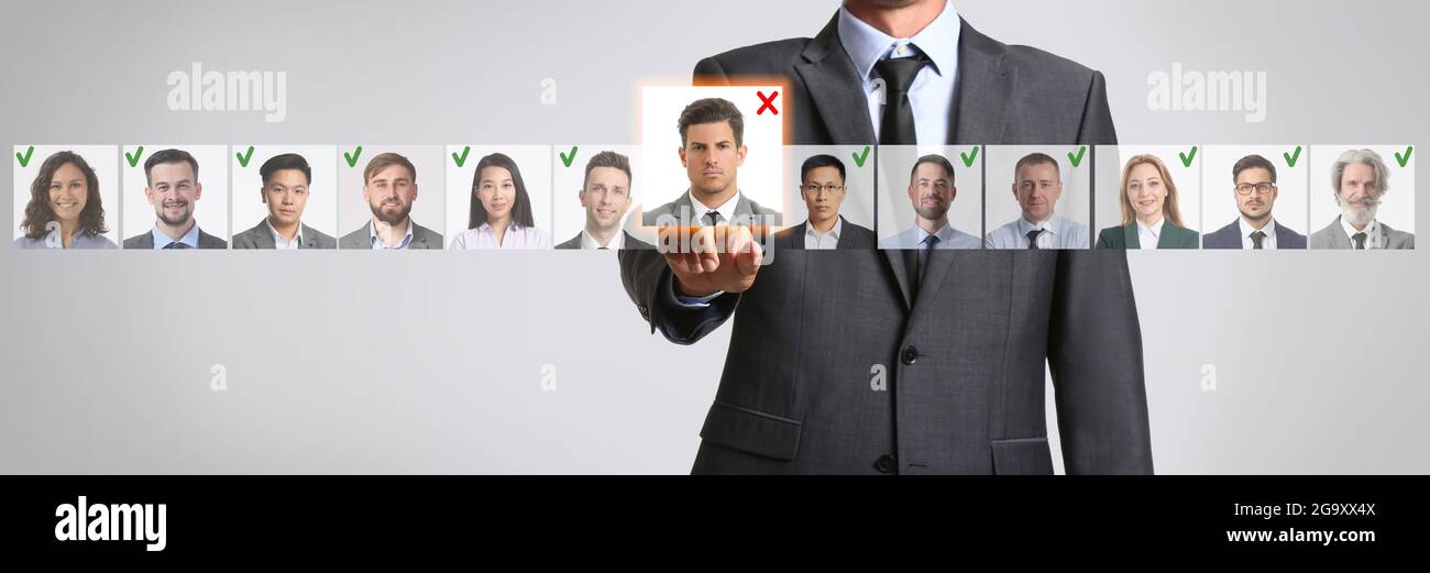 Boss with virtual screen firing office worker against light background ...