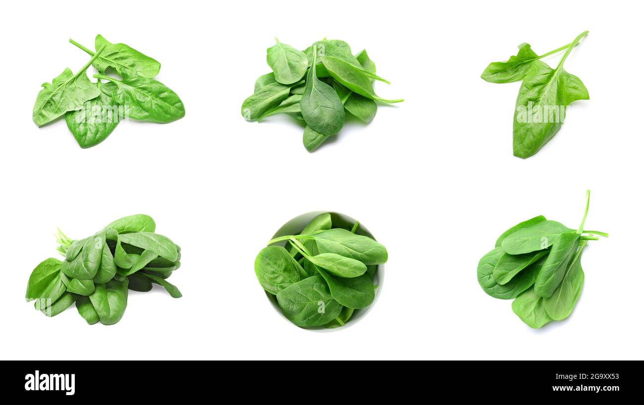 Fresh healthy spinach on white background Stock Photo - Alamy