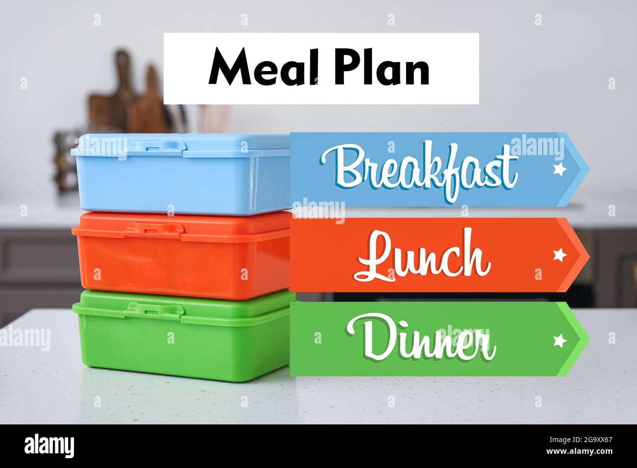 Containers with healthy food on table in kitchen. Concept of meal plan ...