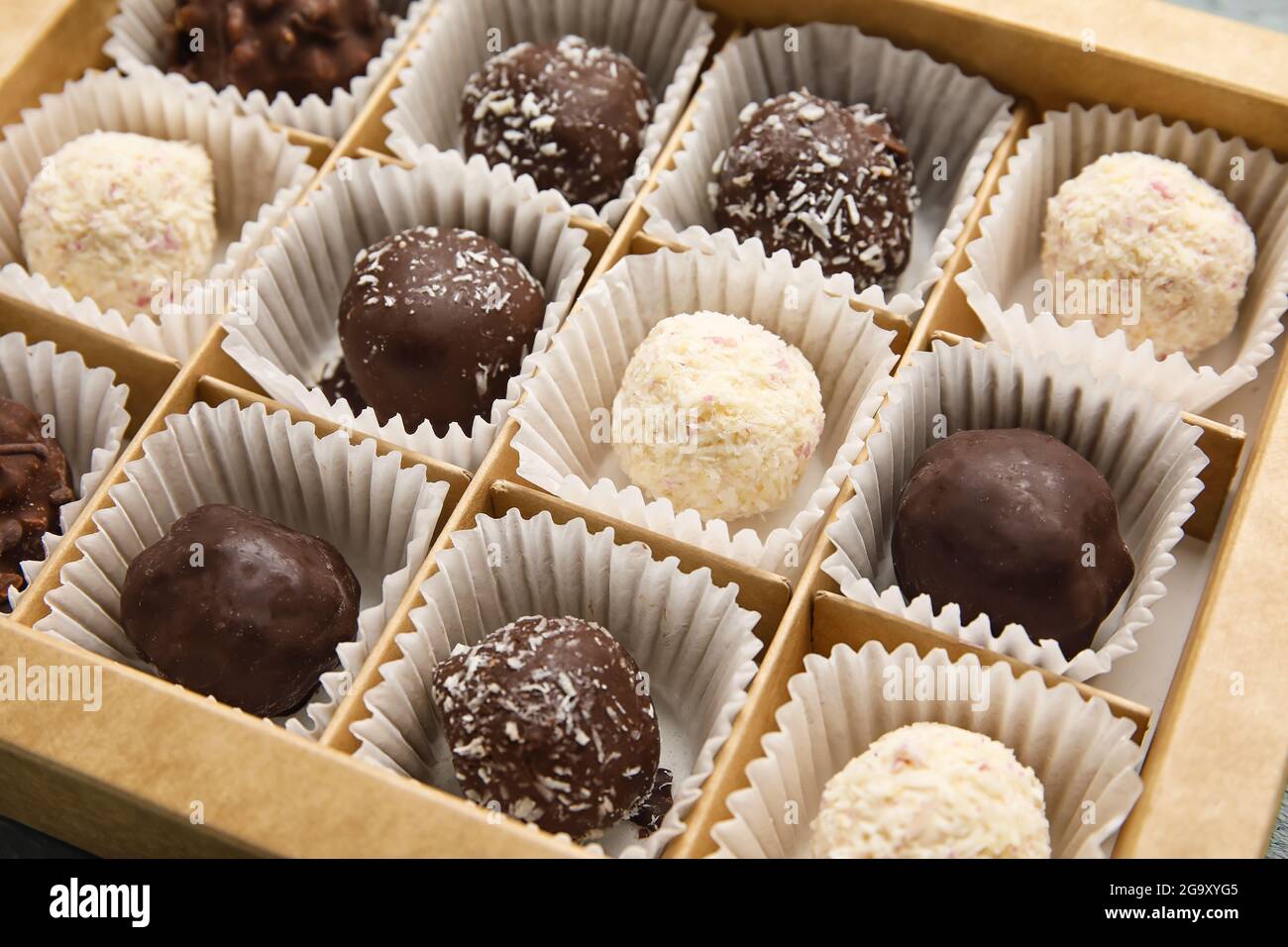 Box with sweet chocolate candies, closeup Stock Photo - Alamy