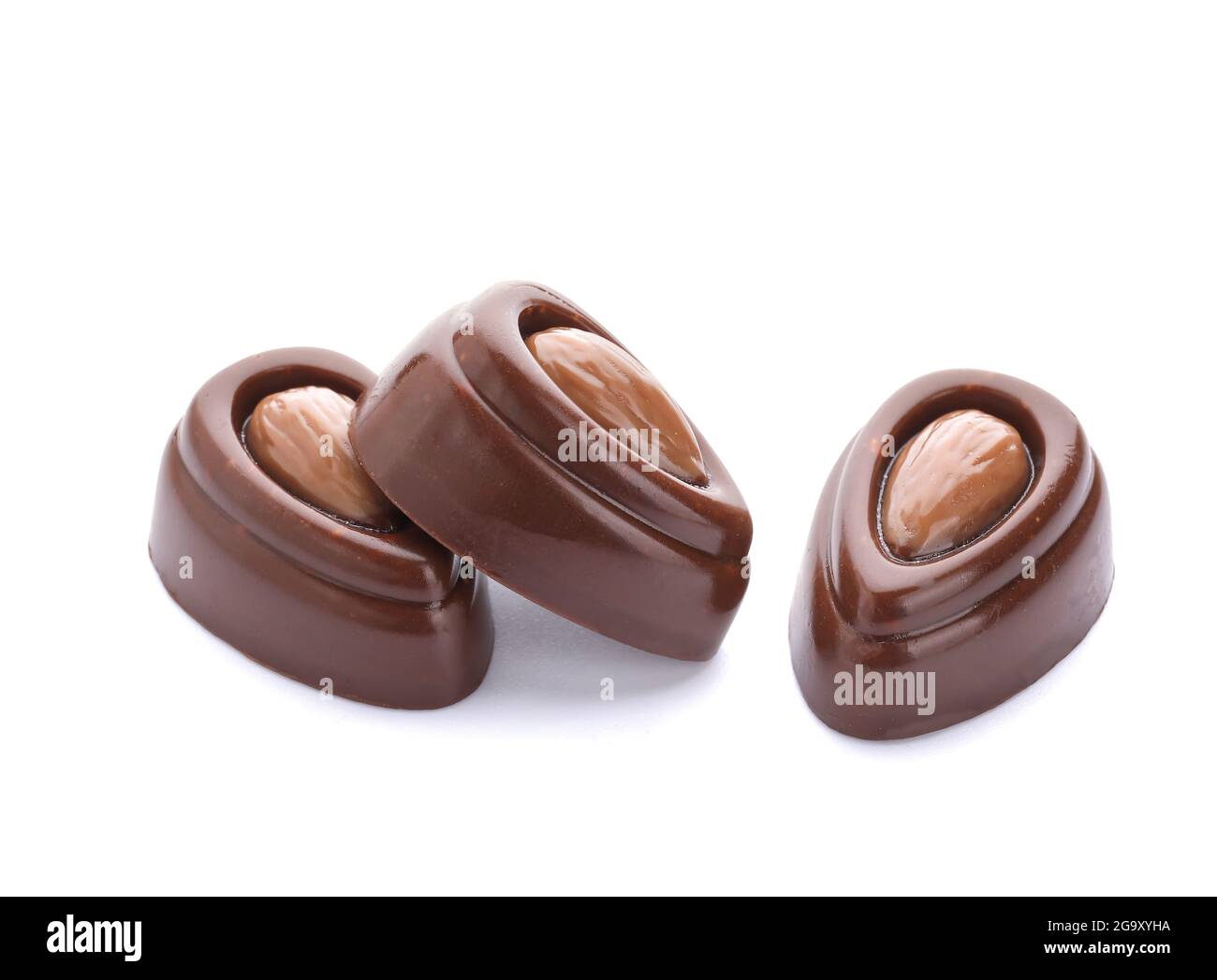 Sweet chocolate candies on white background Stock Photo - Alamy