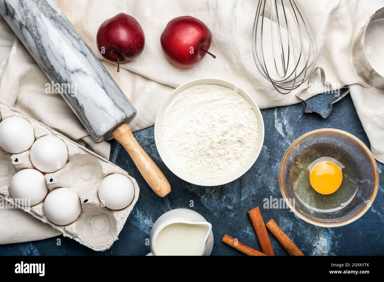 Ingredients for preparing bakery and utensils on color background Stock ...