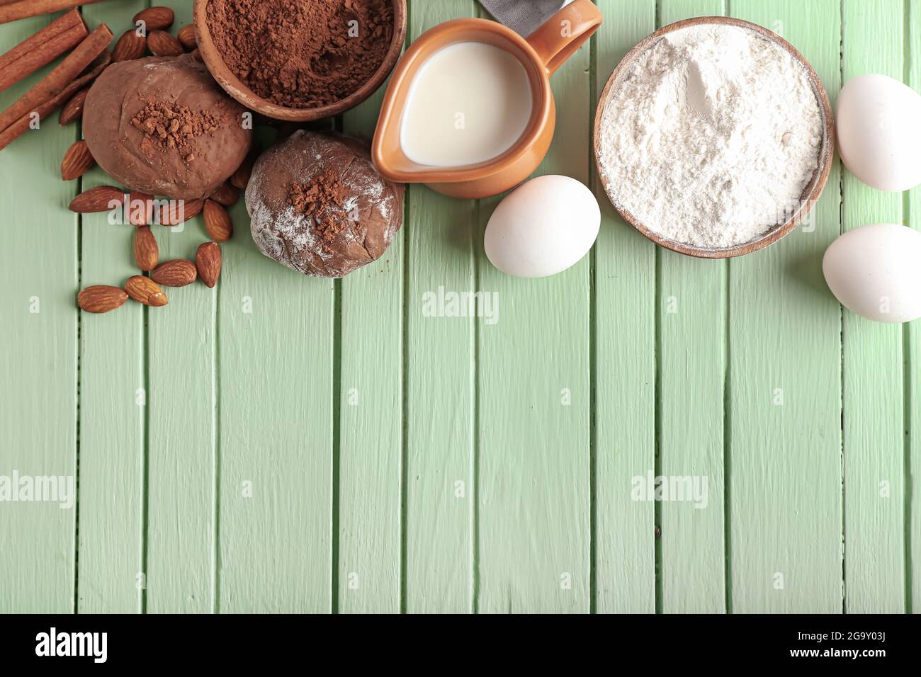 Ingredients for preparing bakery on color wooden background Stock Photo ...