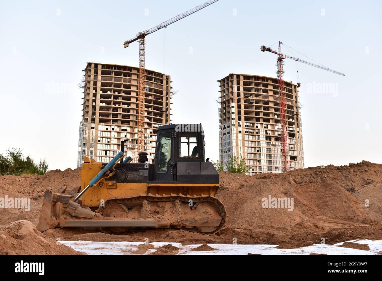 Dozer on earthmoving at construction. Construction machinery and ...