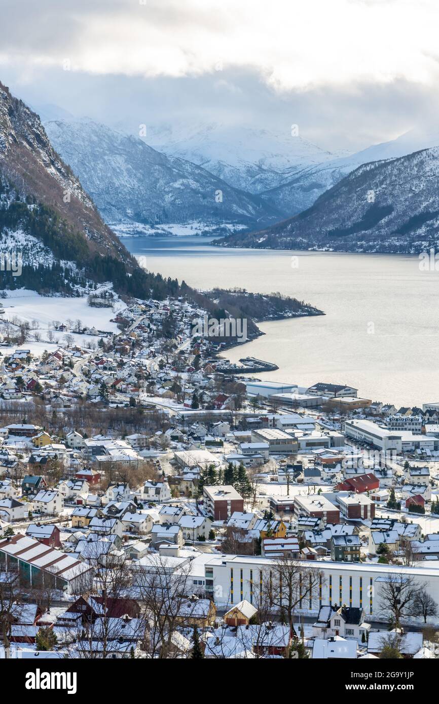 Vertical shot of Volda village and scenic nature during winter in ...