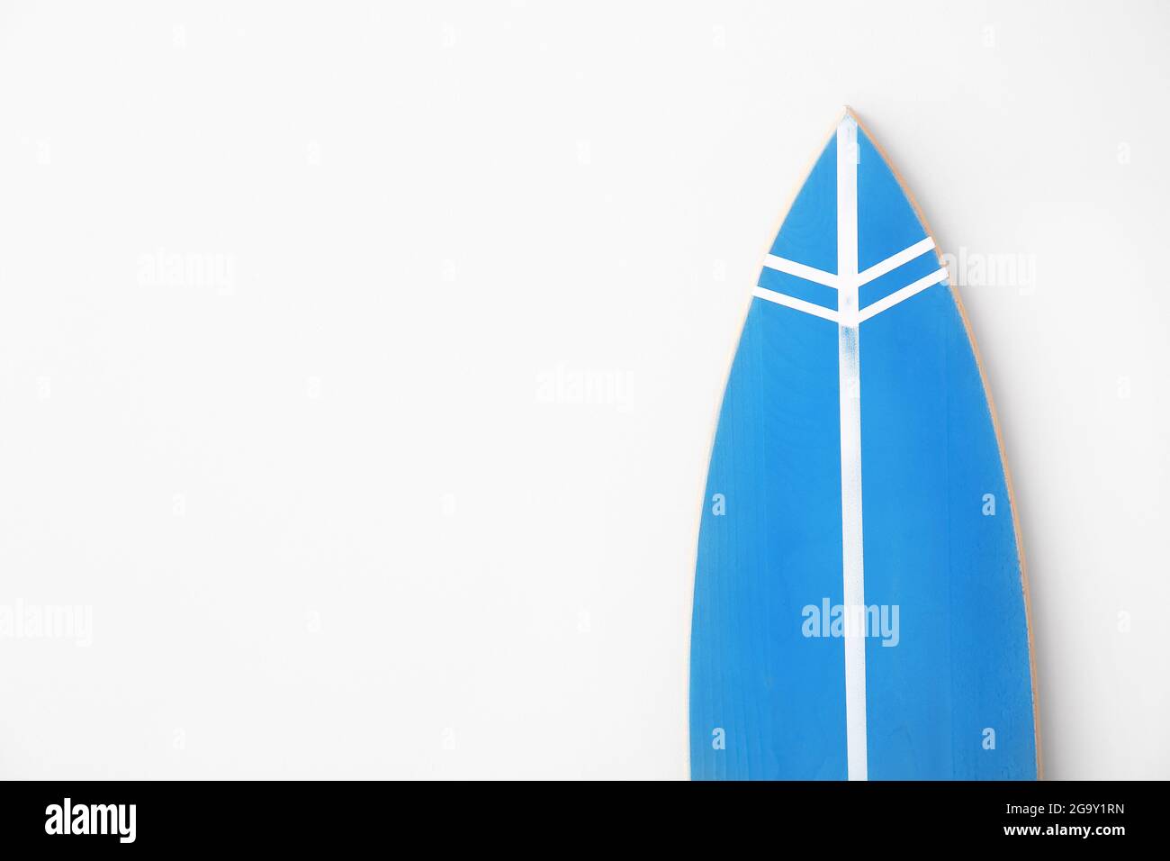 Blue surfboard on white background Stock Photo - Alamy
