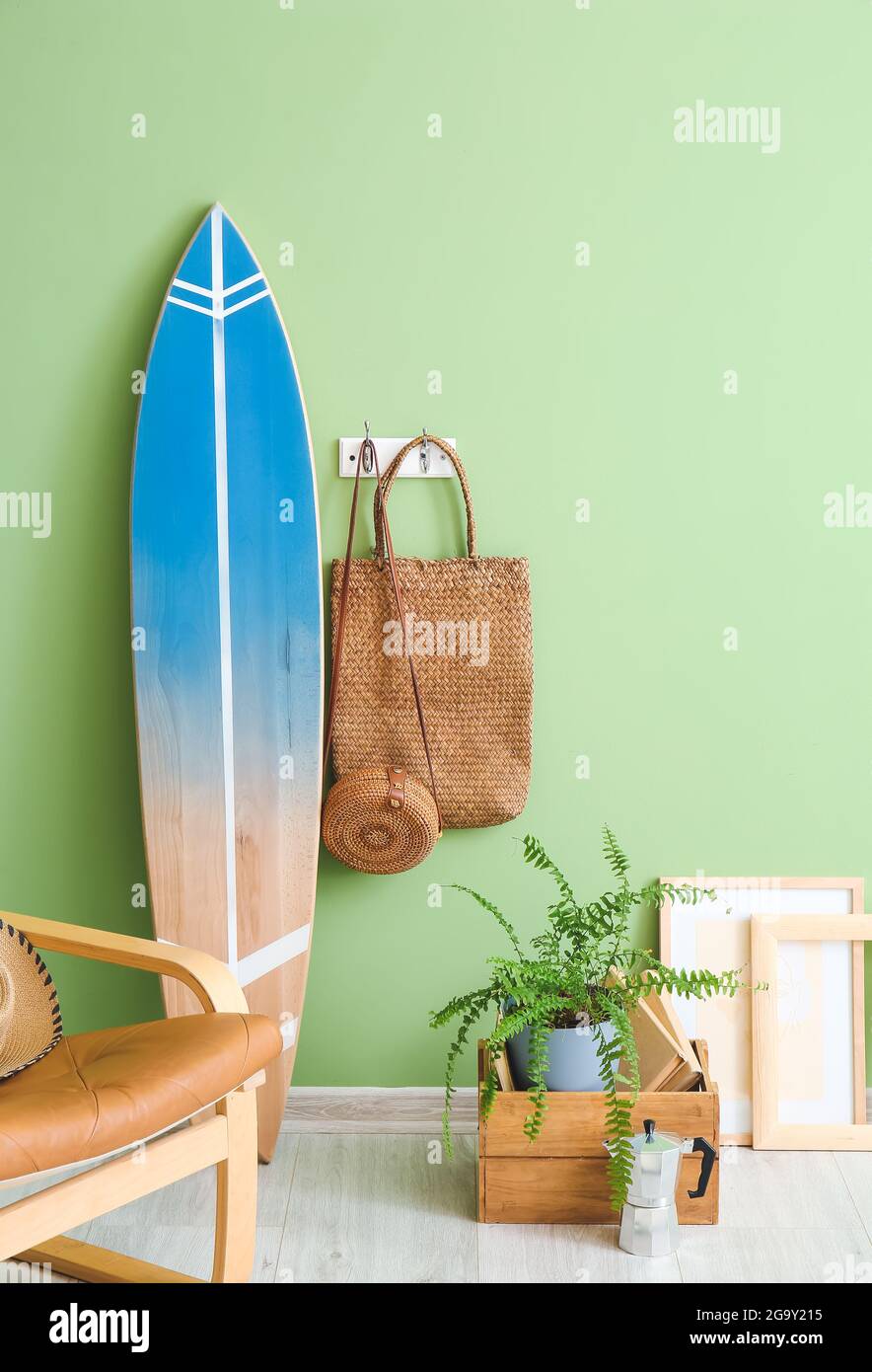 Interior of modern room with surfboard Stock Photo - Alamy