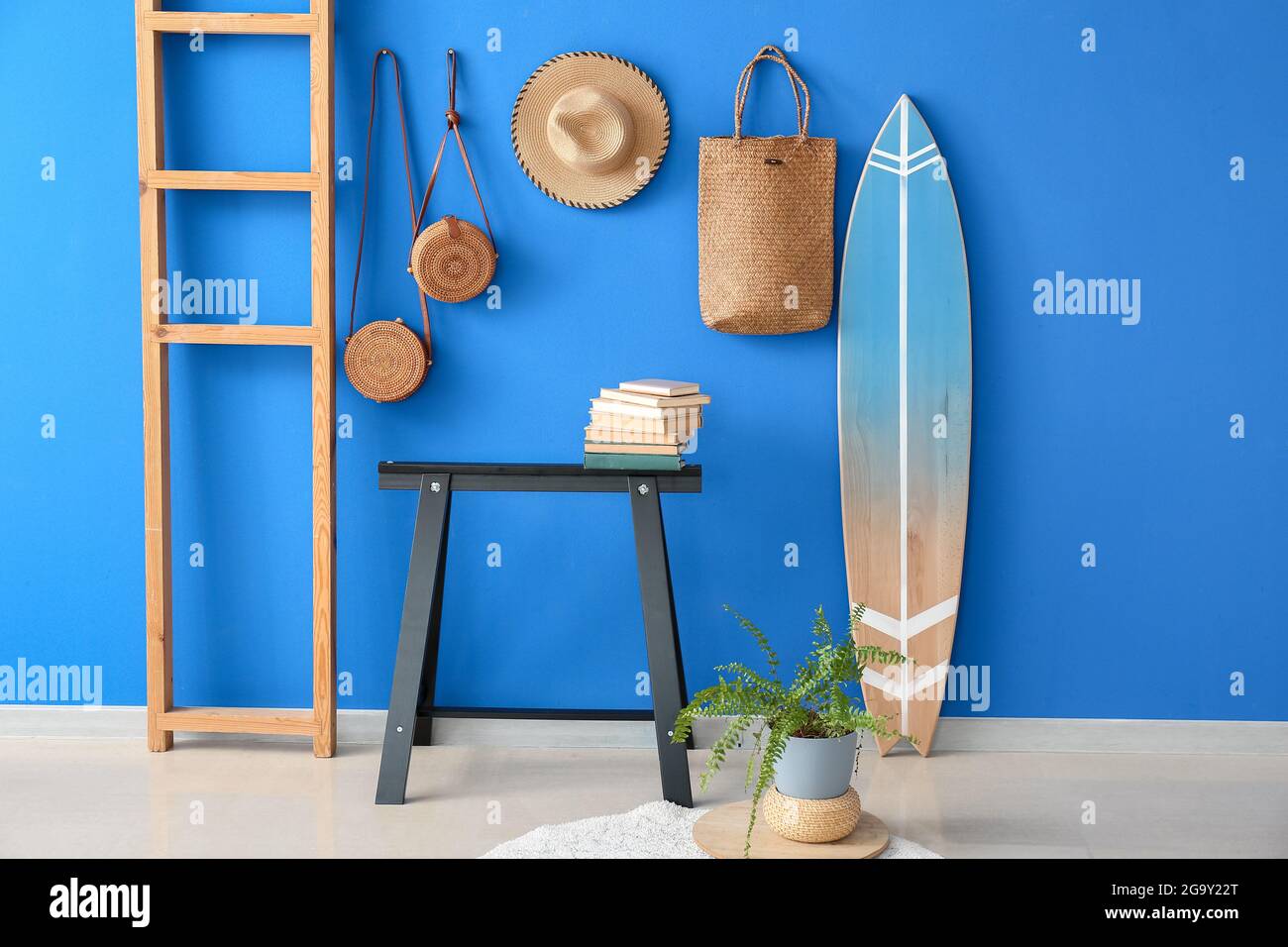 Interior of modern room with surfboard Stock Photo - Alamy