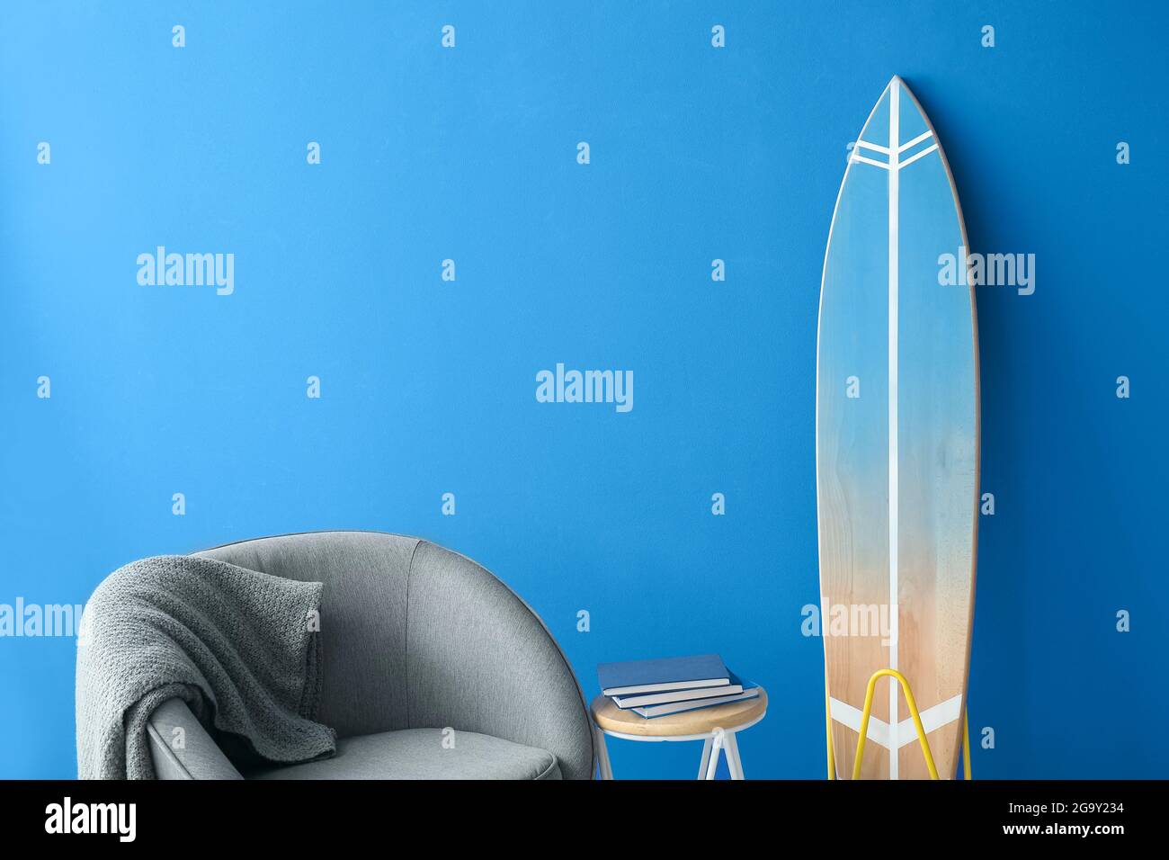 Interior of modern room with surfboard Stock Photo - Alamy