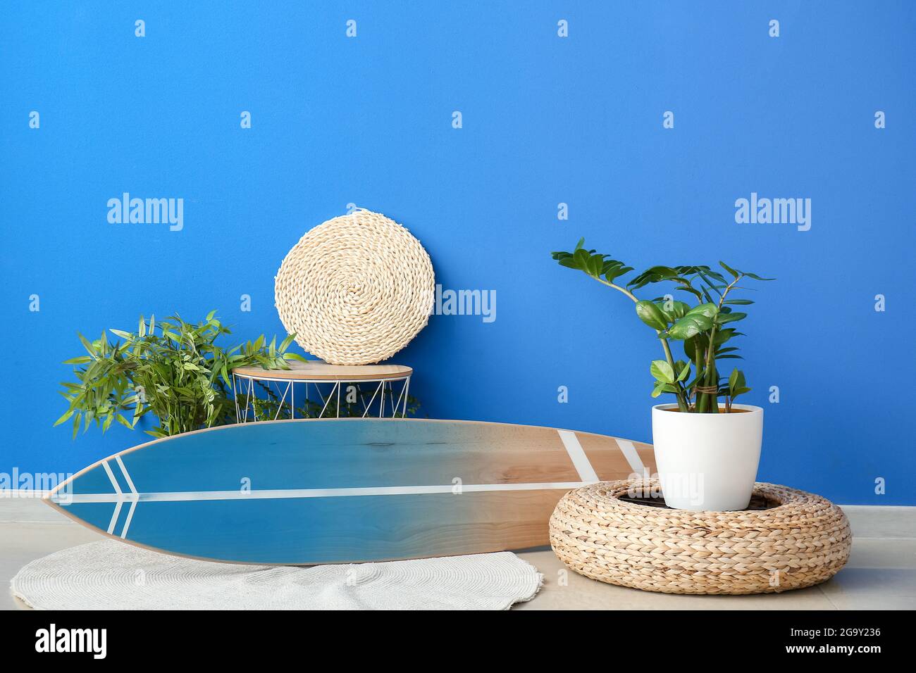 Interior of modern room with surfboard Stock Photo - Alamy