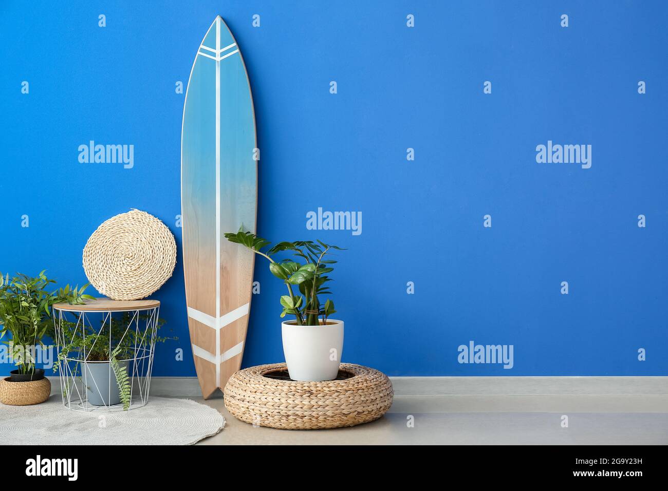 Interior of modern room with surfboard Stock Photo - Alamy