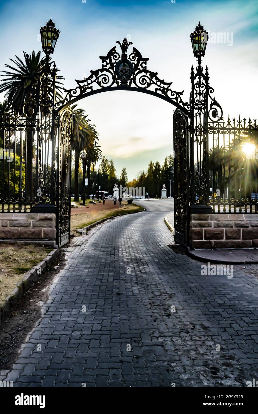 Open metal gate to a park Stock Photo - Alamy