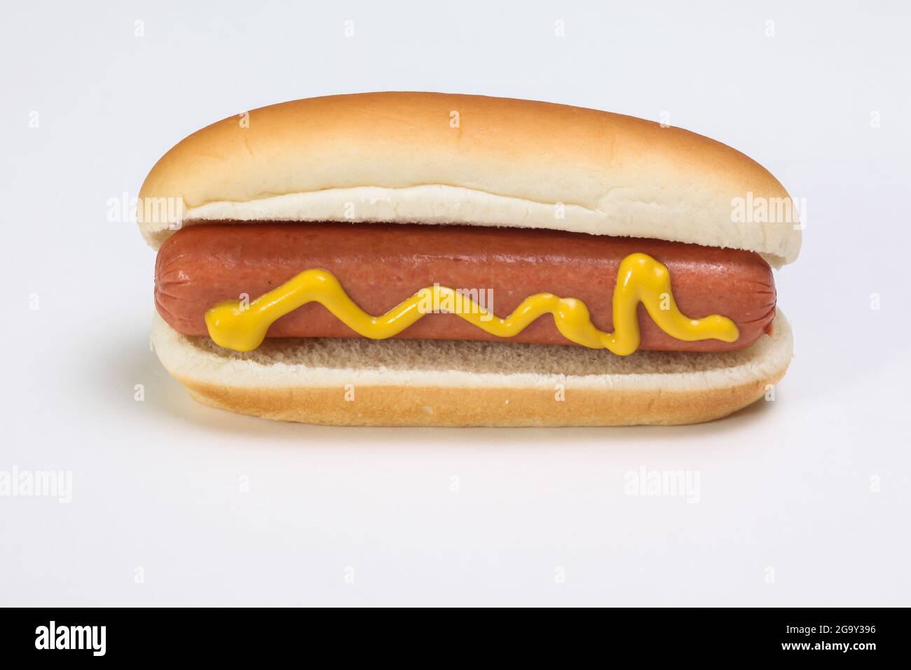 Closeup shot of a hot dog isolated on white Stock Photo - Alamy