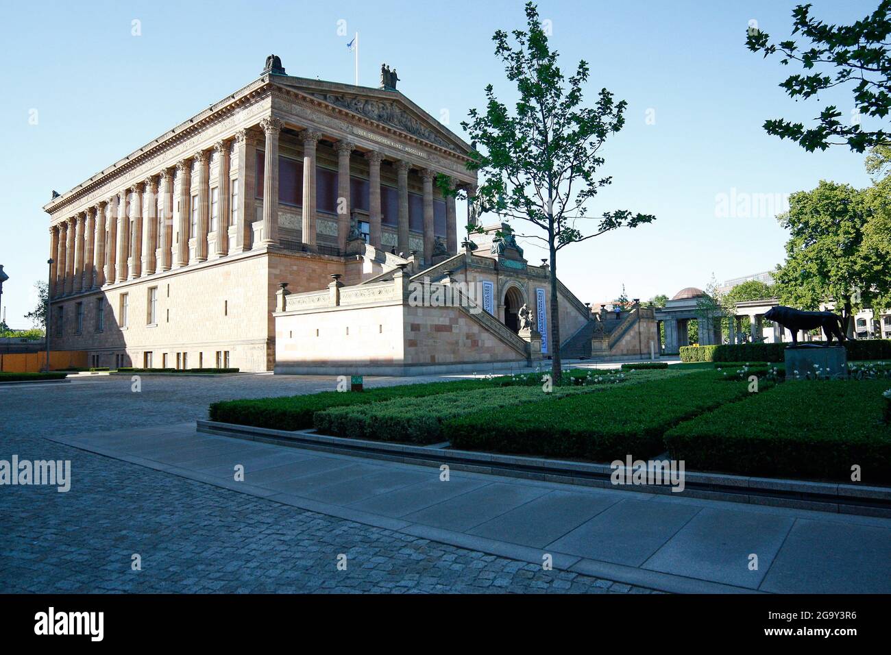 Altes Museum, on Museum Island, Berlin, Germany. The sun penetrates ...