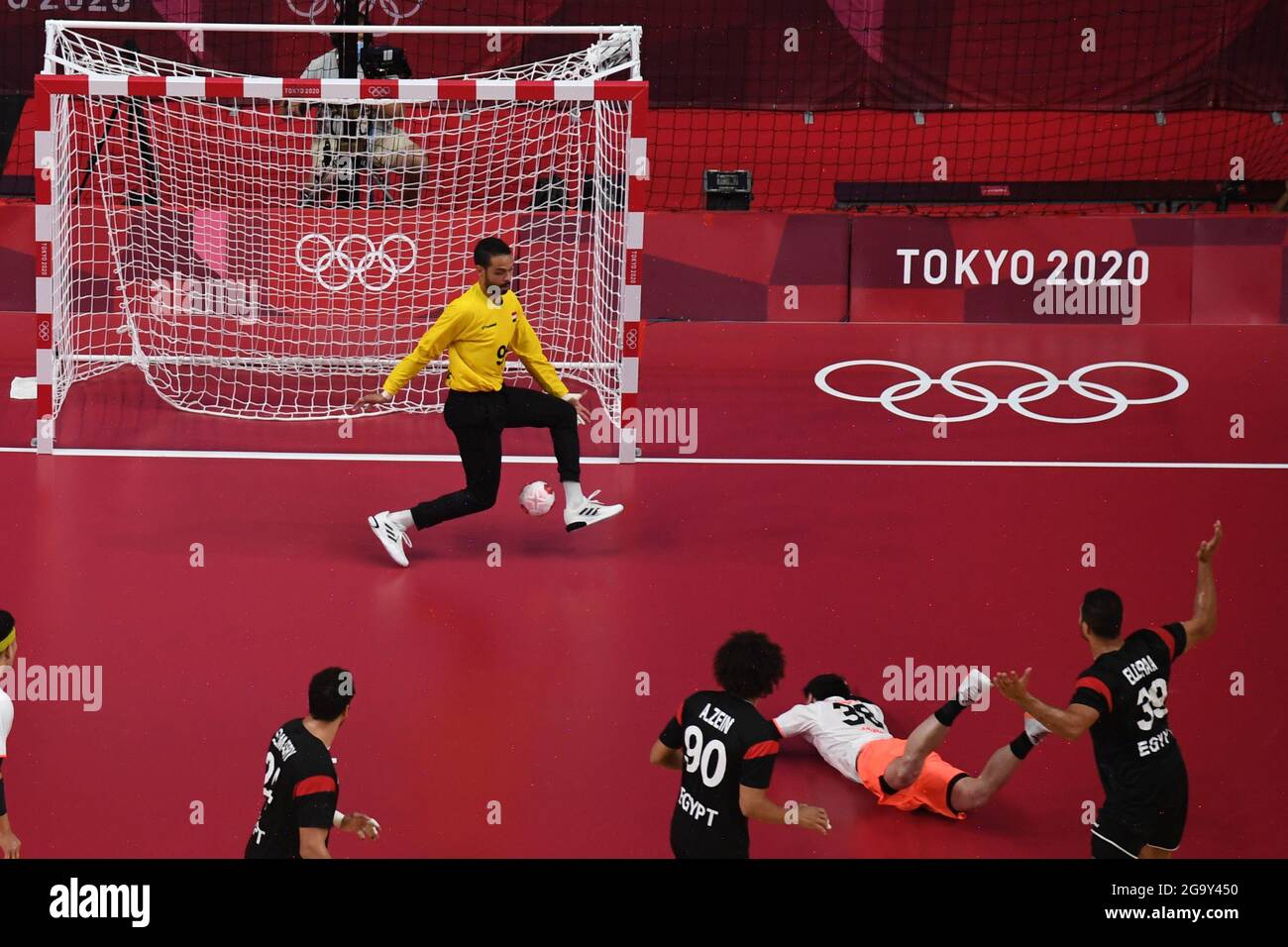 Tokyo, Japan. 28th July, 2021. Goalkeeper of Egypt Mohamed Eltayar (top ...