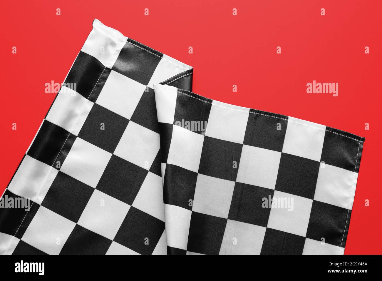Racing flag on color background Stock Photo - Alamy