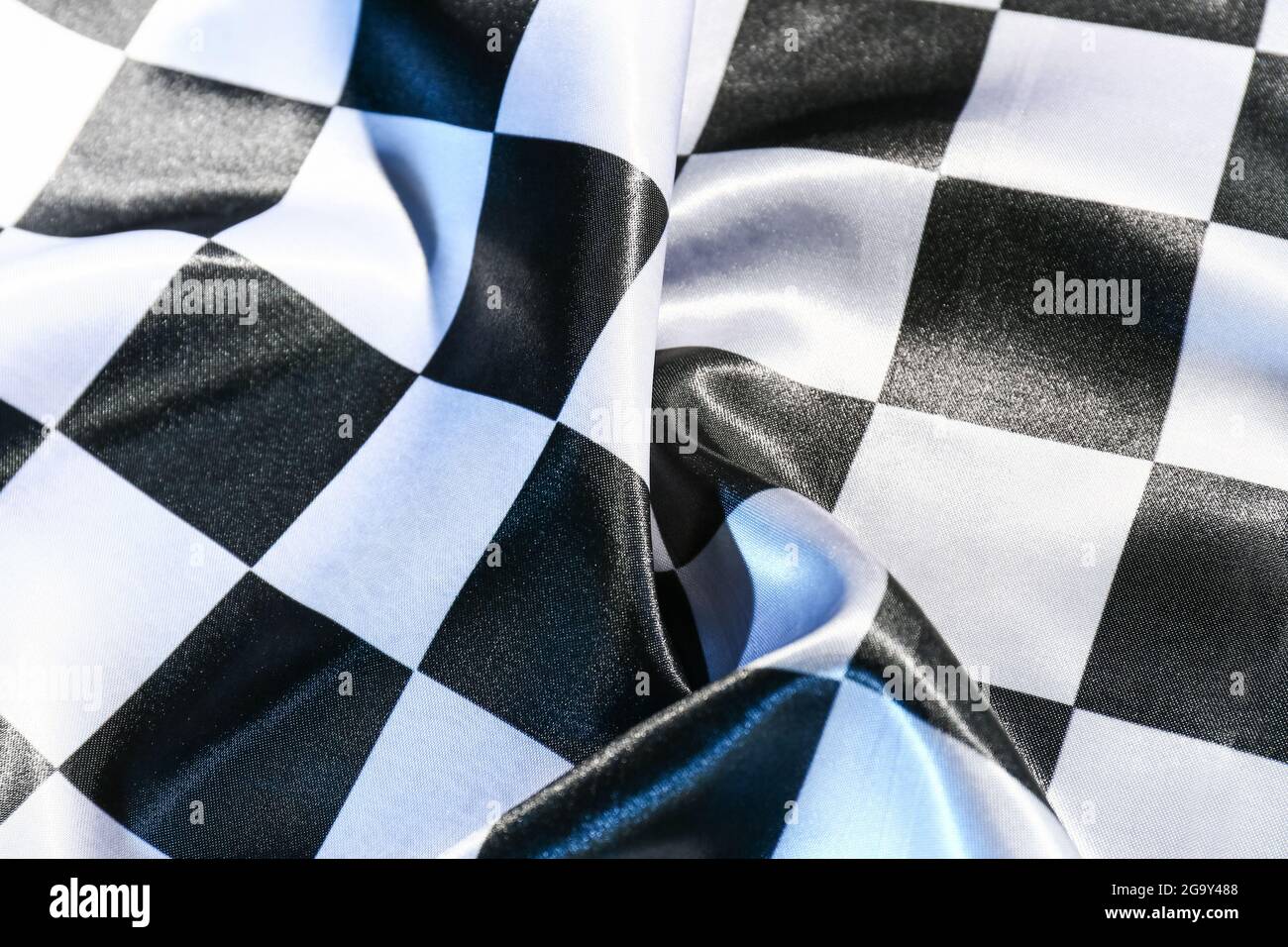 Racing flag as background, closeup Stock Photo - Alamy