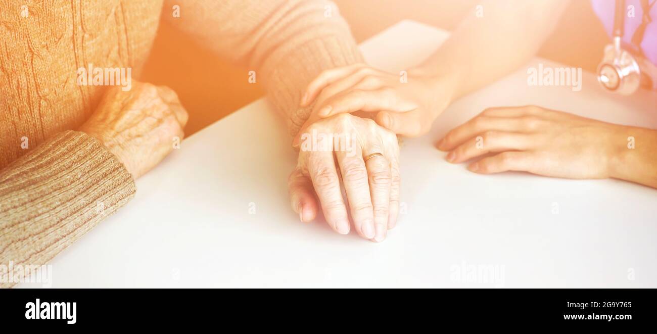 Handshake, caring, trust, treatment and support Stock Photo - Alamy