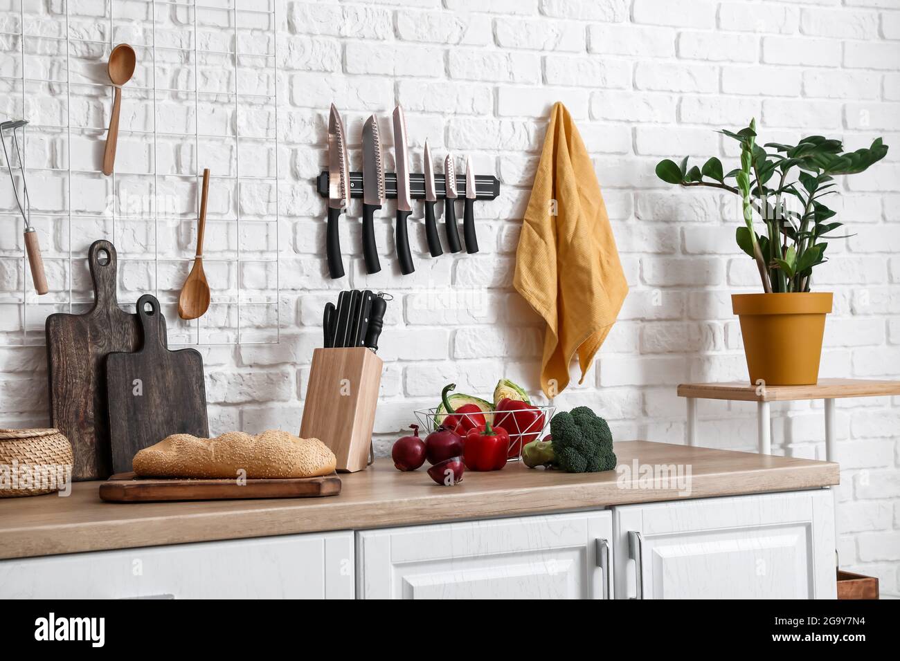 Counter with food and utensils in kitchen Stock Photo - Alamy