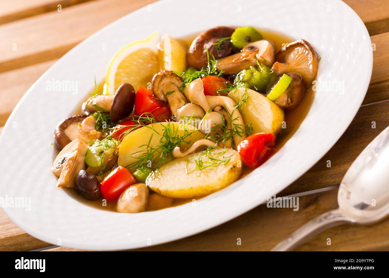 Pottage in country style of mushrooms with vegetables Stock Photo - Alamy
