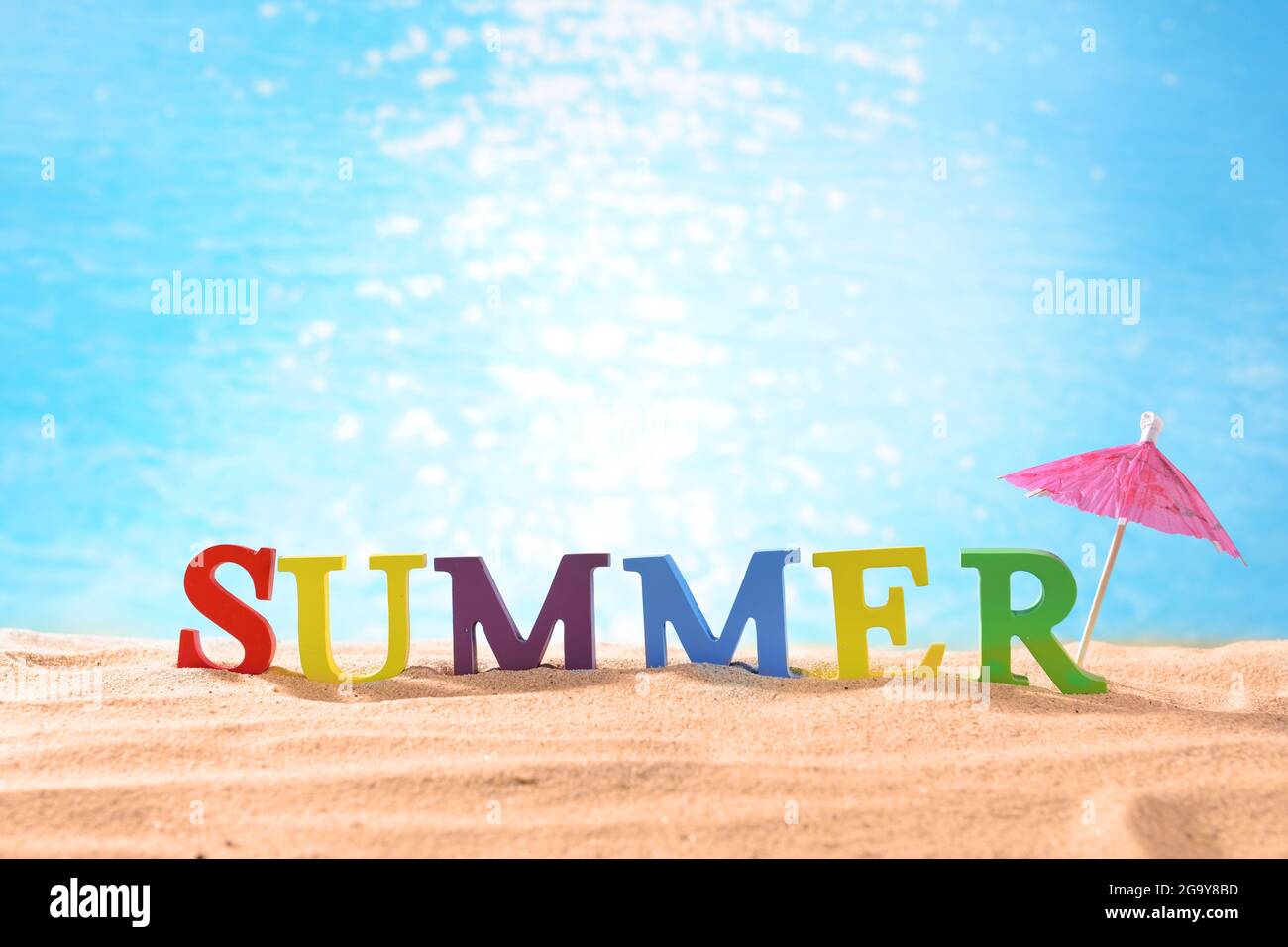 Word summer on beach sand Stock Photo - Alamy